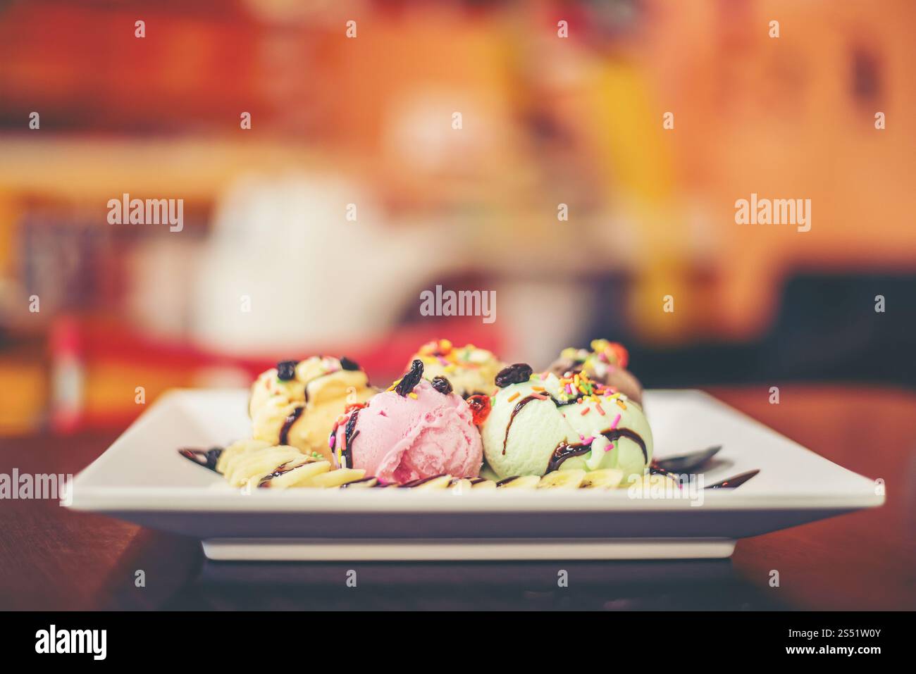 ice cream sundae vanilla strawberry chocolate lemon scoops with banana ...