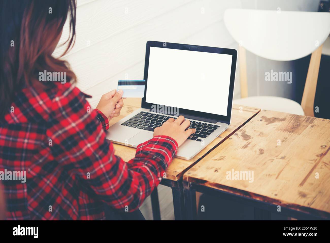 Woman buying online in cafe hi-res stock photography and images - Alamy