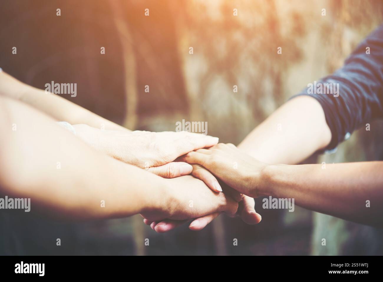 Hands help together hi-res stock photography and images - Alamy