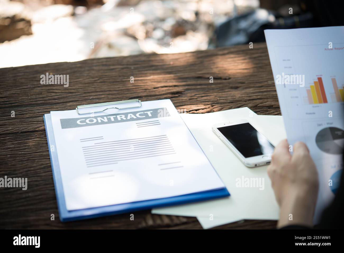 business woman working with documents graphs ,analyzing investm ...