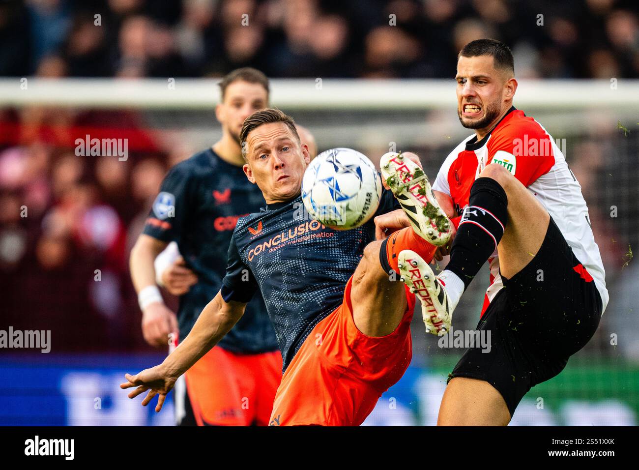 Rotterdam, The Netherlands. 12th Jan, 2025. Rotterdam - Jens Toornstra of FC Utrecht, David ...