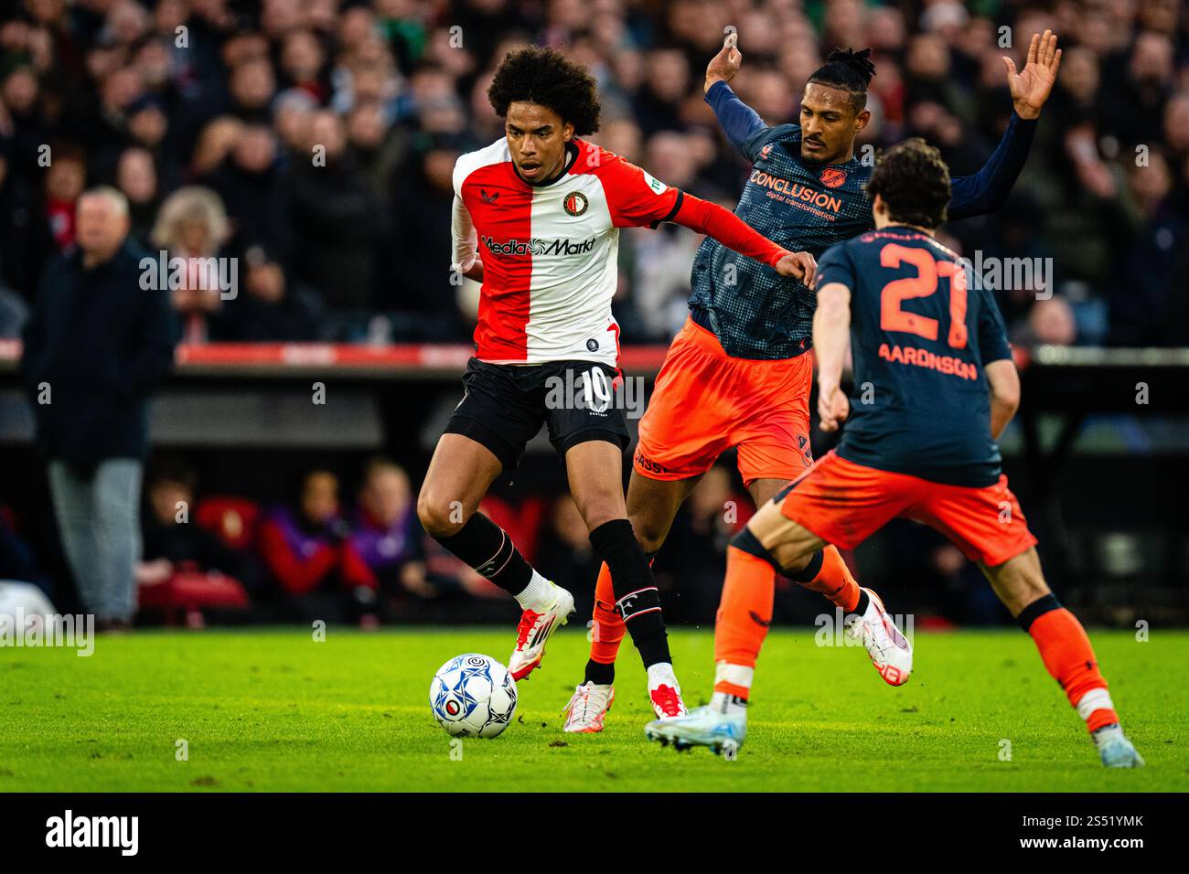 Rotterdam, The Netherlands. 12th Jan, 2025. Rotterdam - Calvin Stengs of Feyenoord, Sebastien ...