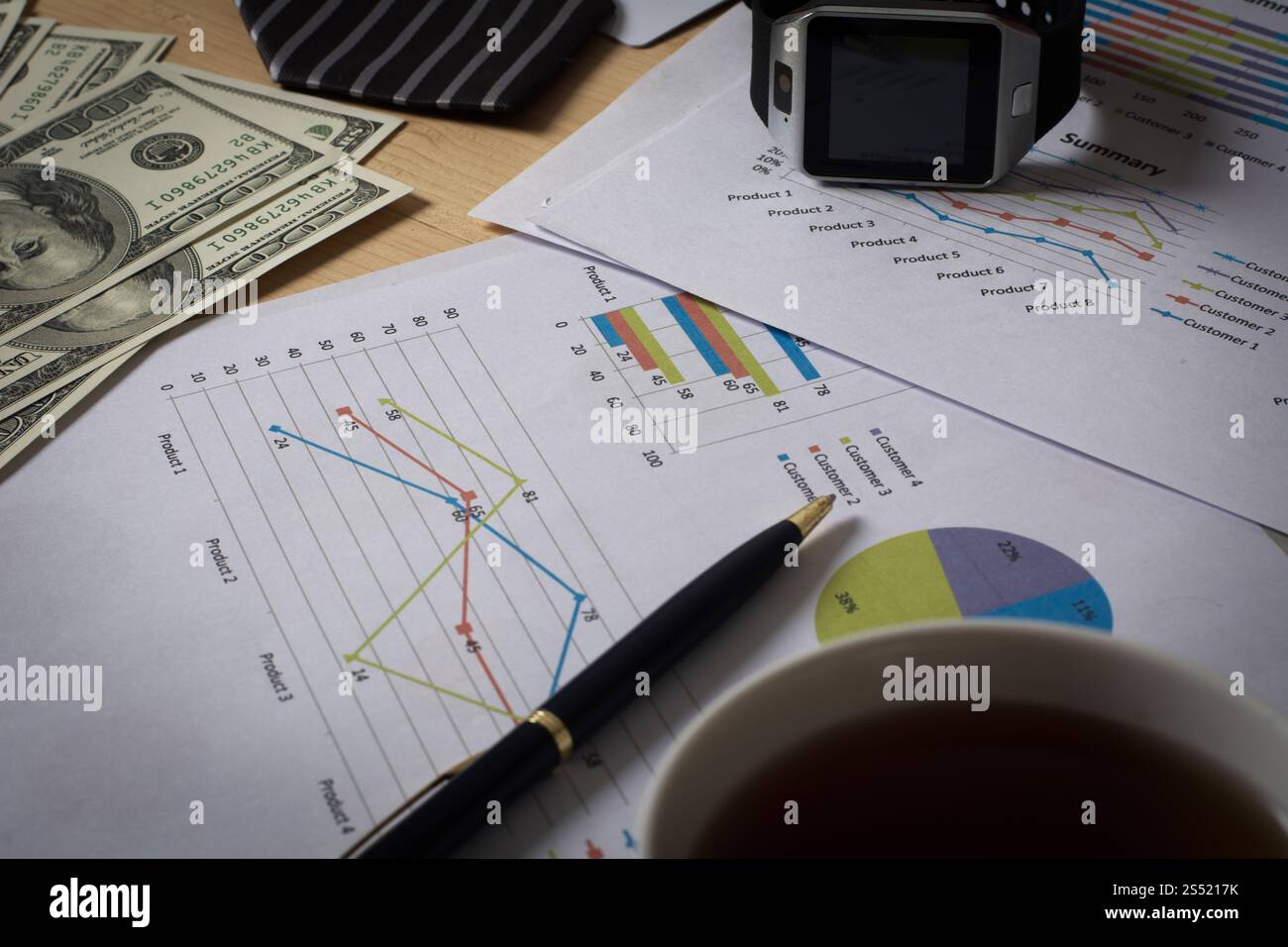 business workplace with paper chart,graph and money. Business fi ...