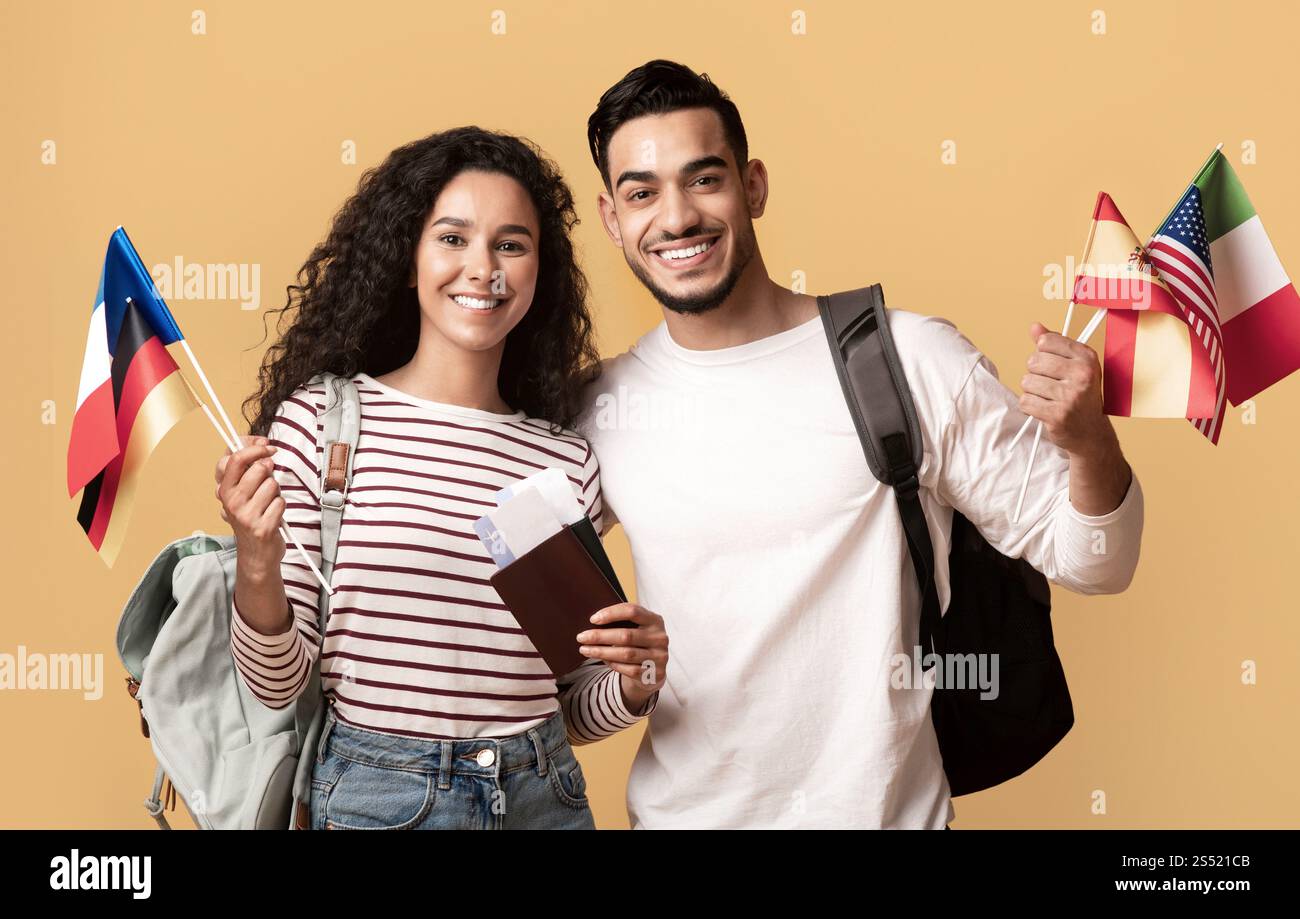 Travelling Abroad. Arab Tourists Couple Holding Passports With Tickets ...