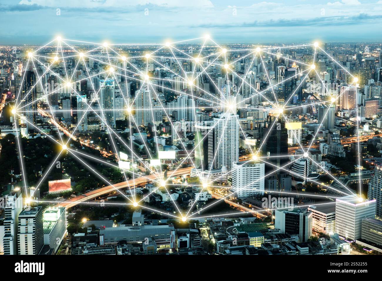 Cityscape and network connection concept in the city at night. B ...