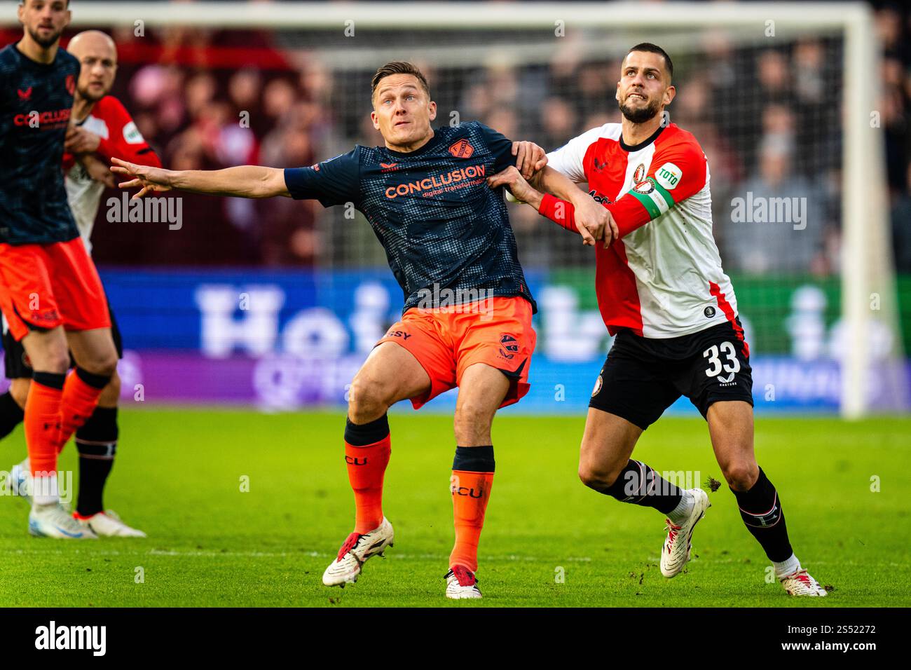 Rotterdam, The Netherlands. 12th Jan, 2025. Rotterdam - Jens Toornstra of FC Utrecht, David ...