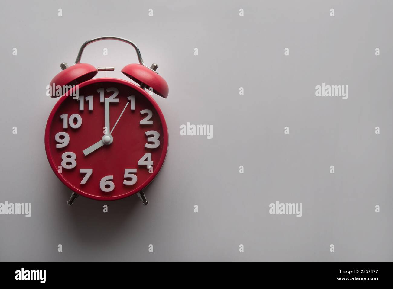 Red alarm clock isolated on white background. Business time conc. Red ...