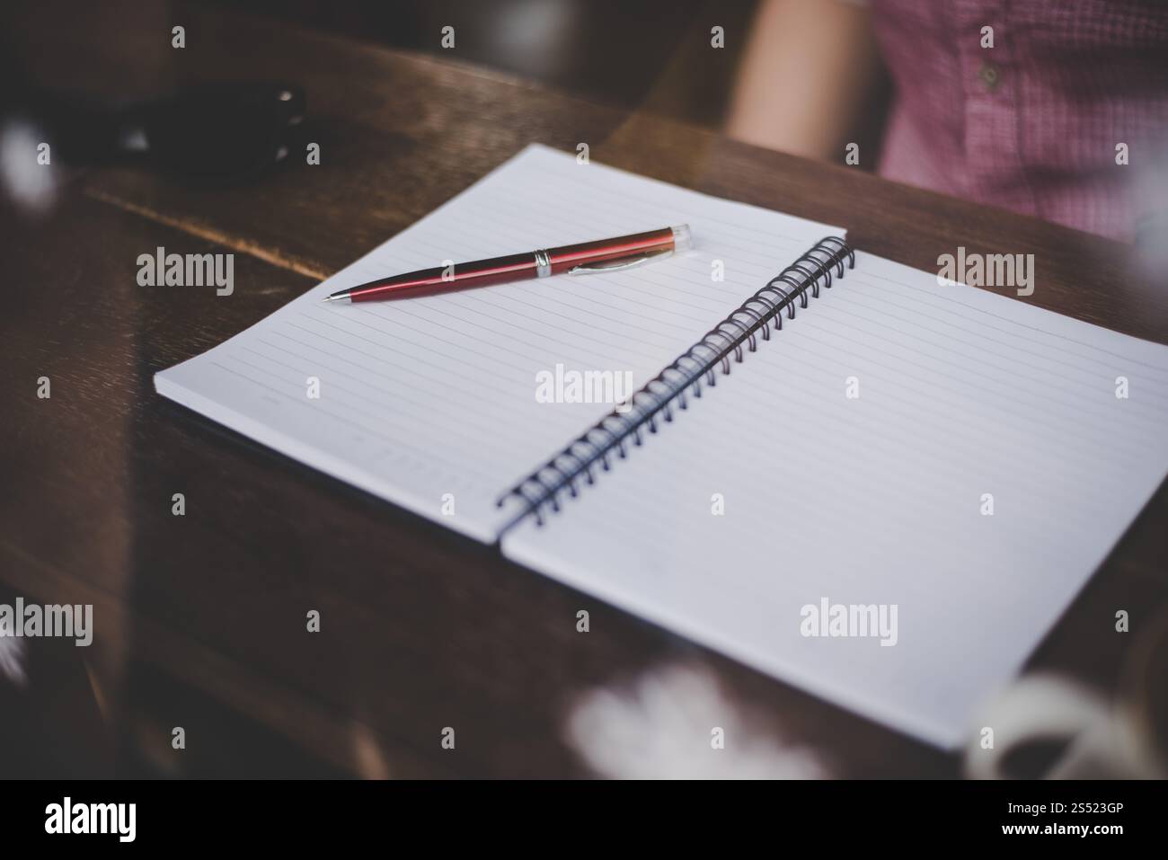 Small notepad with pen on wood background. windows Reflection Stock ...