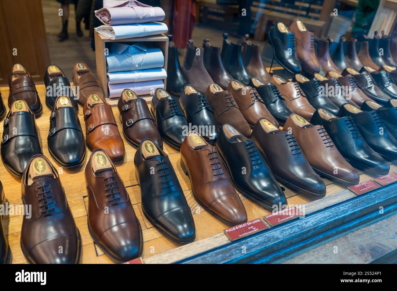Elegant display of handcrafted leather shoes in a storefront Stock ...