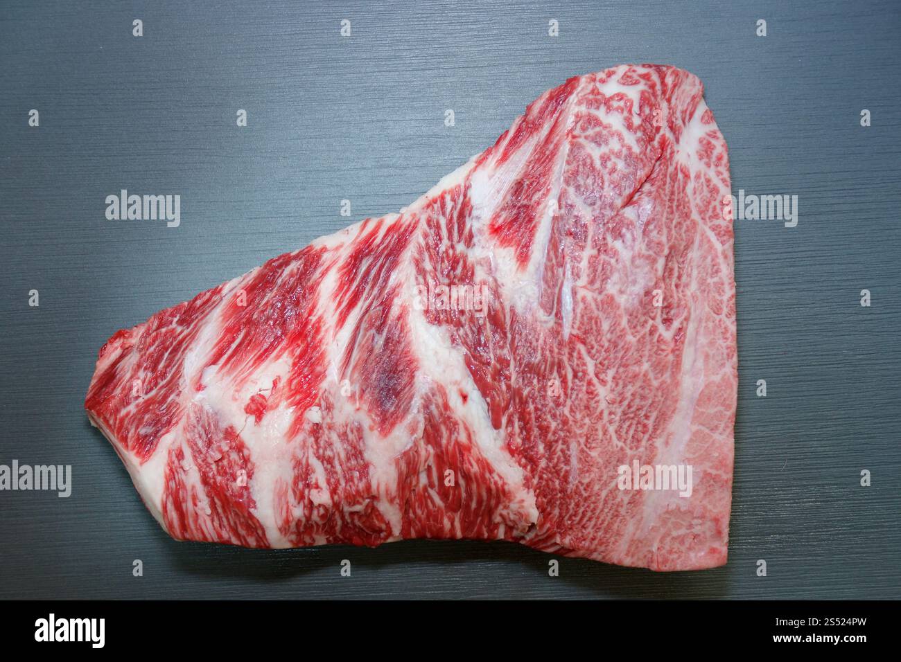 Marbled Premium Meat Cut on Gray Background Highlighting Texture and ...