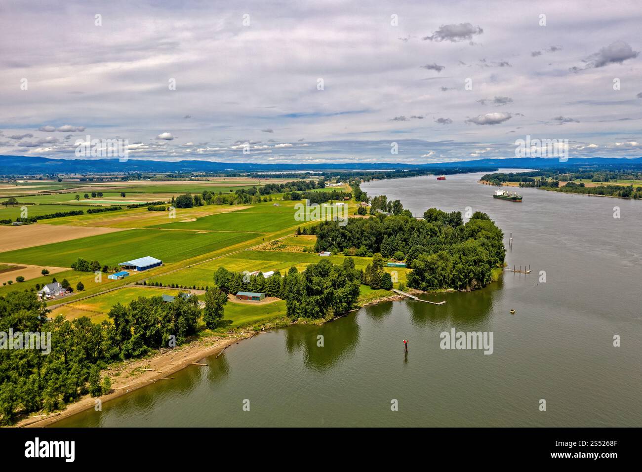 Scenic Aerial View of River Bend Amid Expansive Agricultural Landscape ...