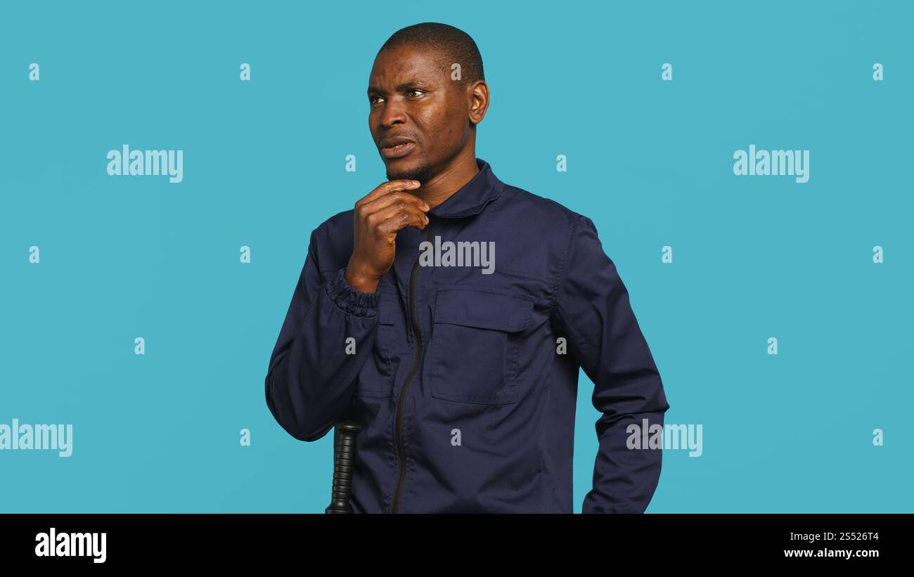 Portrait of security guard using notepad to take notes of suspicious ...