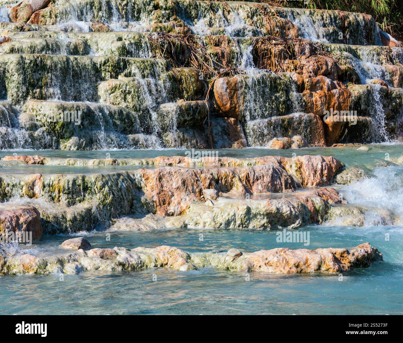 Natural spa with waterfalls and hot springs at Saturnia thermal baths ...