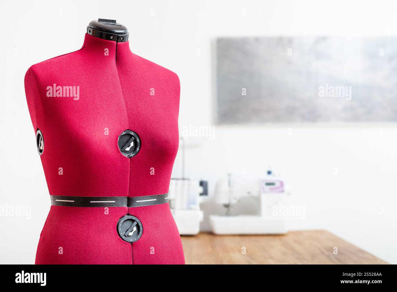 dressmaker dummy in tailor workshop with sewing machines Stock Photo ...