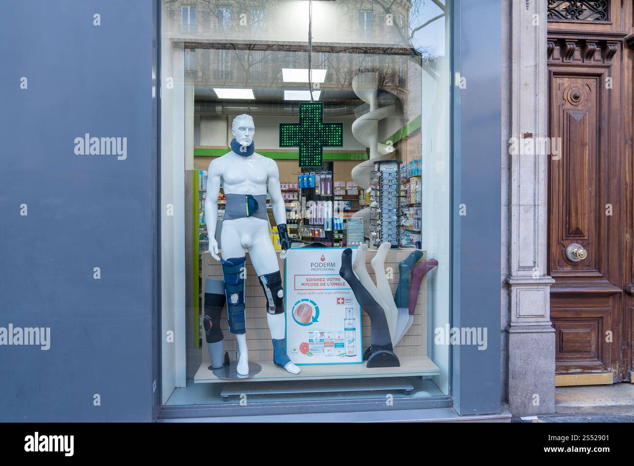 Display of medical support products in a pharmacy window in downtown ...