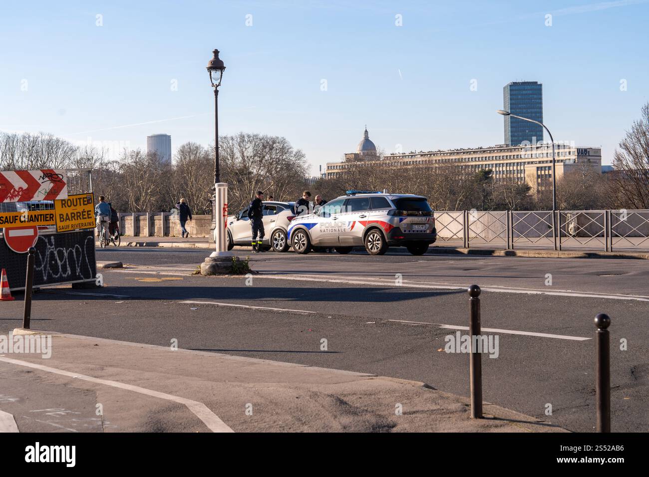 Traffic stop on a city street with police officers in action Stock ...