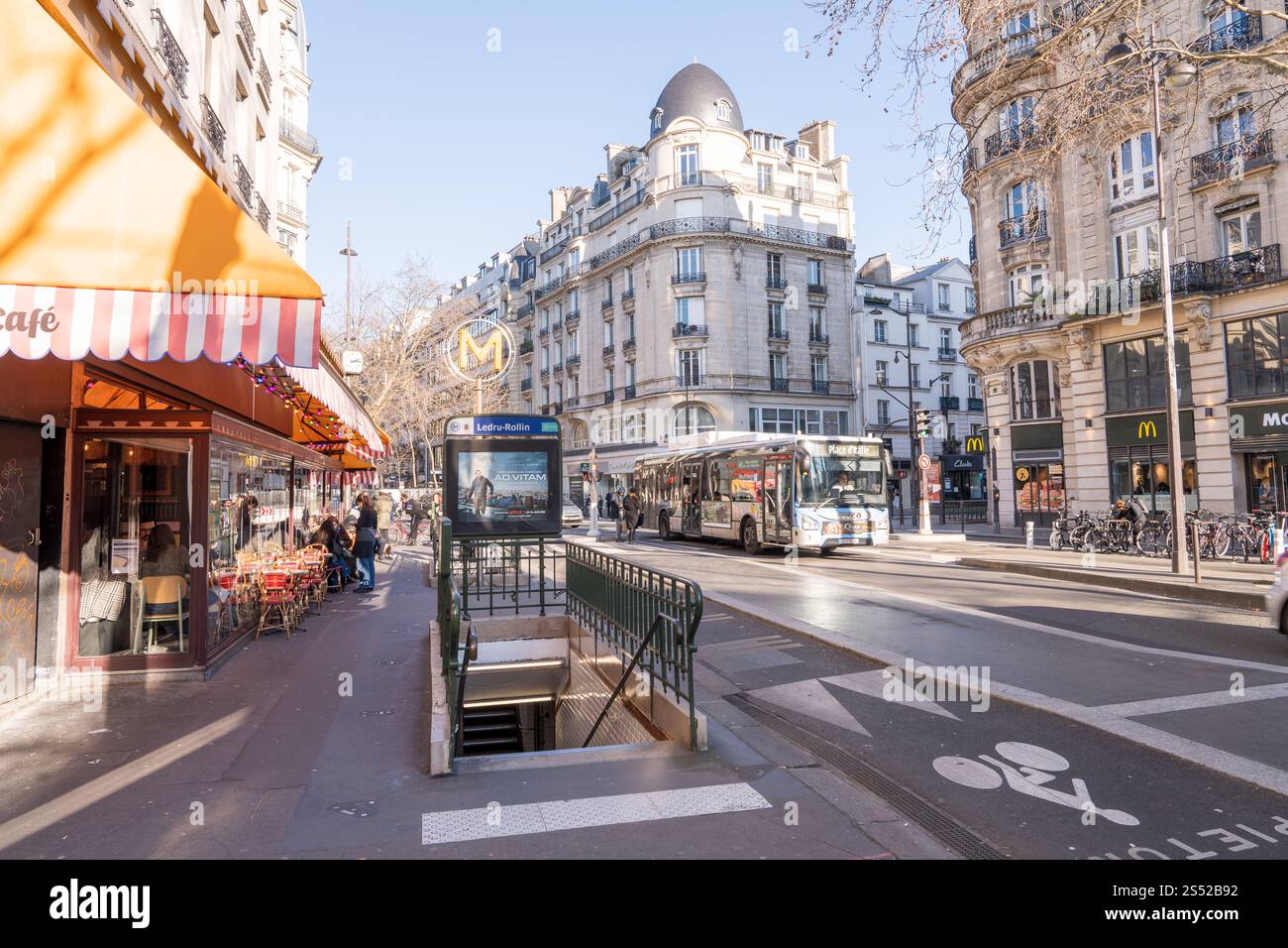 Street view of a bustling Paris neighborhood with metro entrance and ...