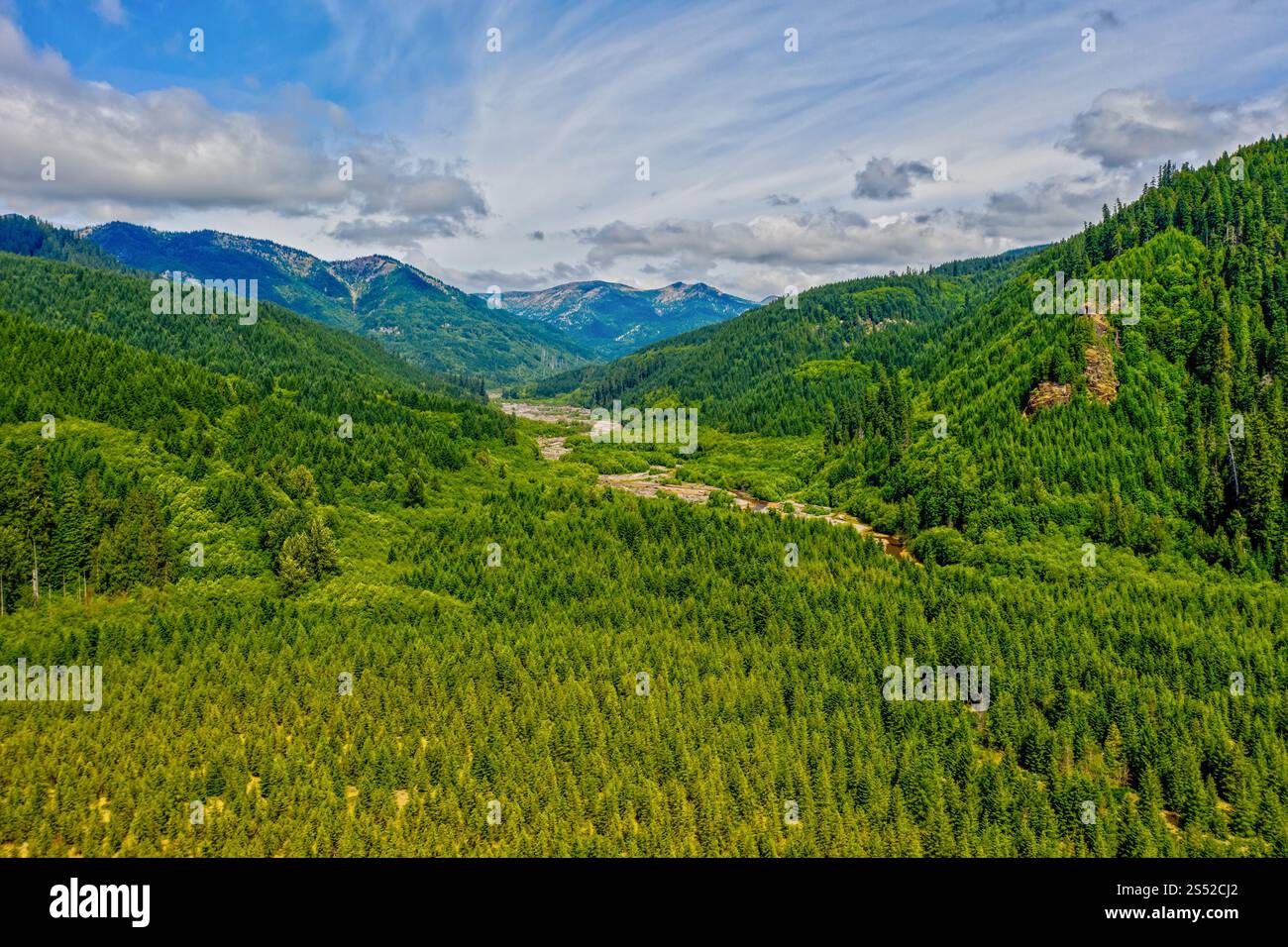 Panoramic View of Lush Green Valley Surrounded by Majestic Mountain ...