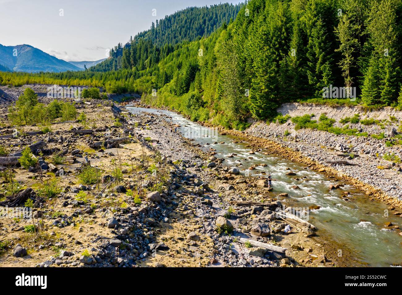 Scenic Mountain Stream Flowing Through a Rocky Forested Landscape ...