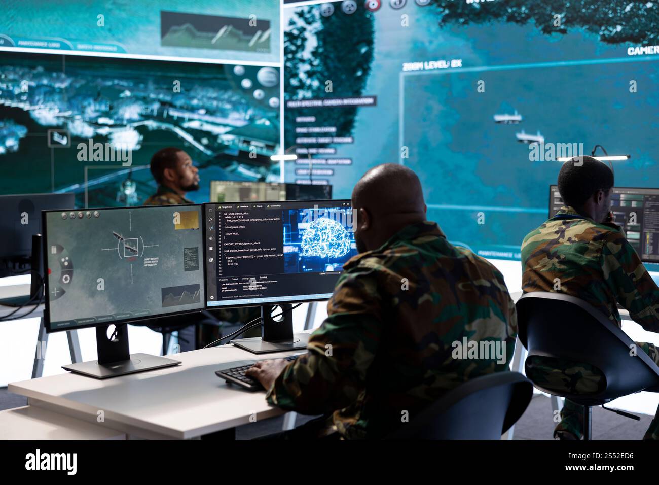 Military specialist in a high tech control center managing satellite ...
