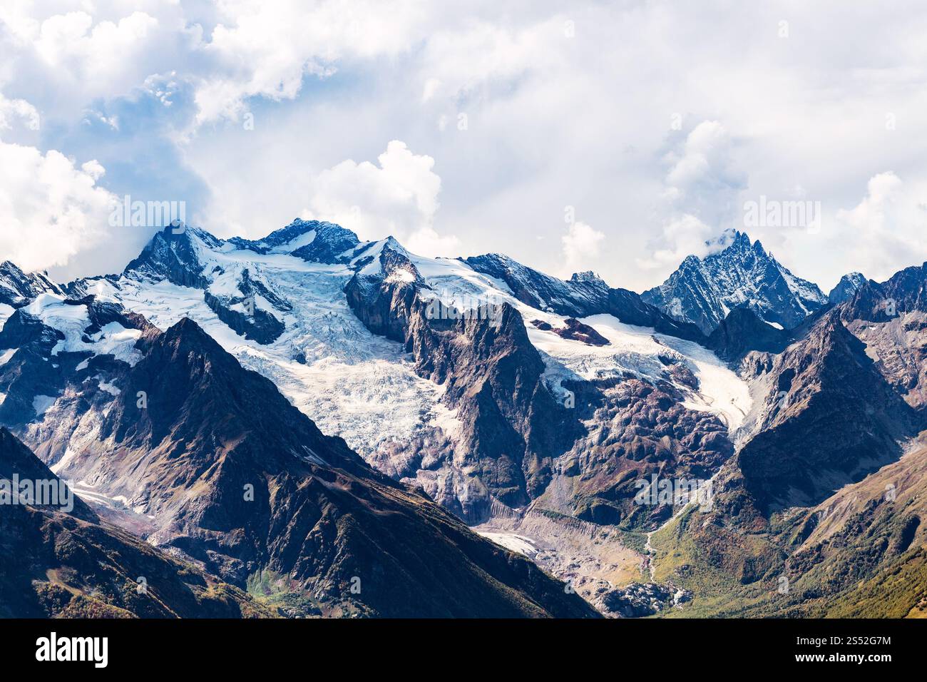travel to North Caucasus region region - view of snow-covered mountain ...