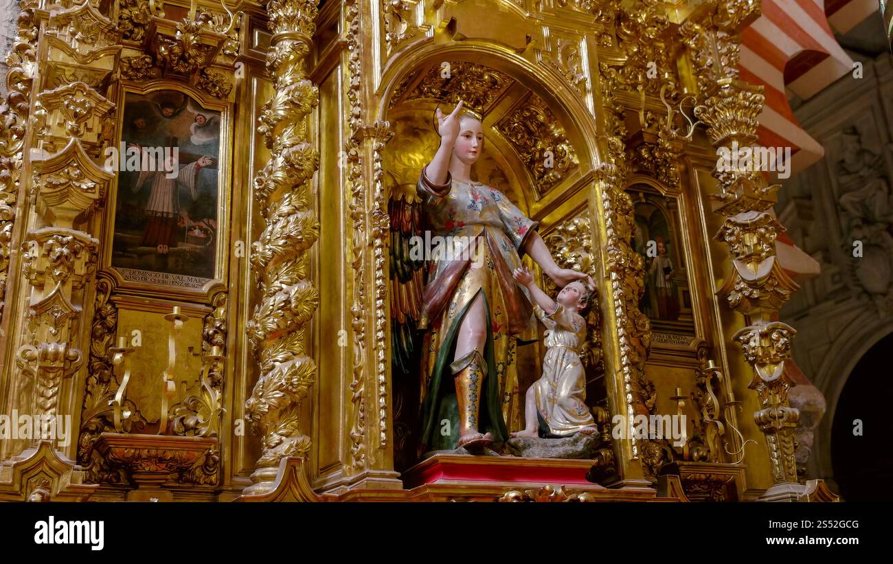 statue of mary and child in the mosque-cathedral of cordoba Stock Photo ...