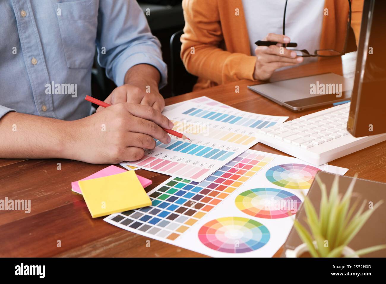 Graphic designer working on digital tablet. artist drawing on graphic ...