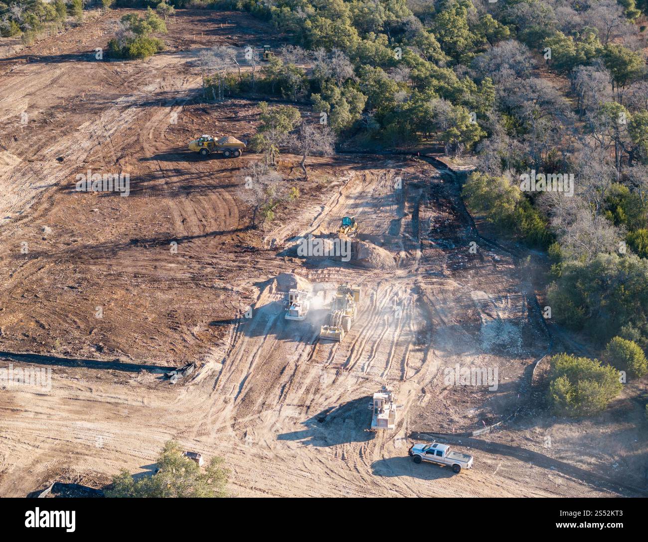 Drone view of construction site being cleared of trees in preparation ...
