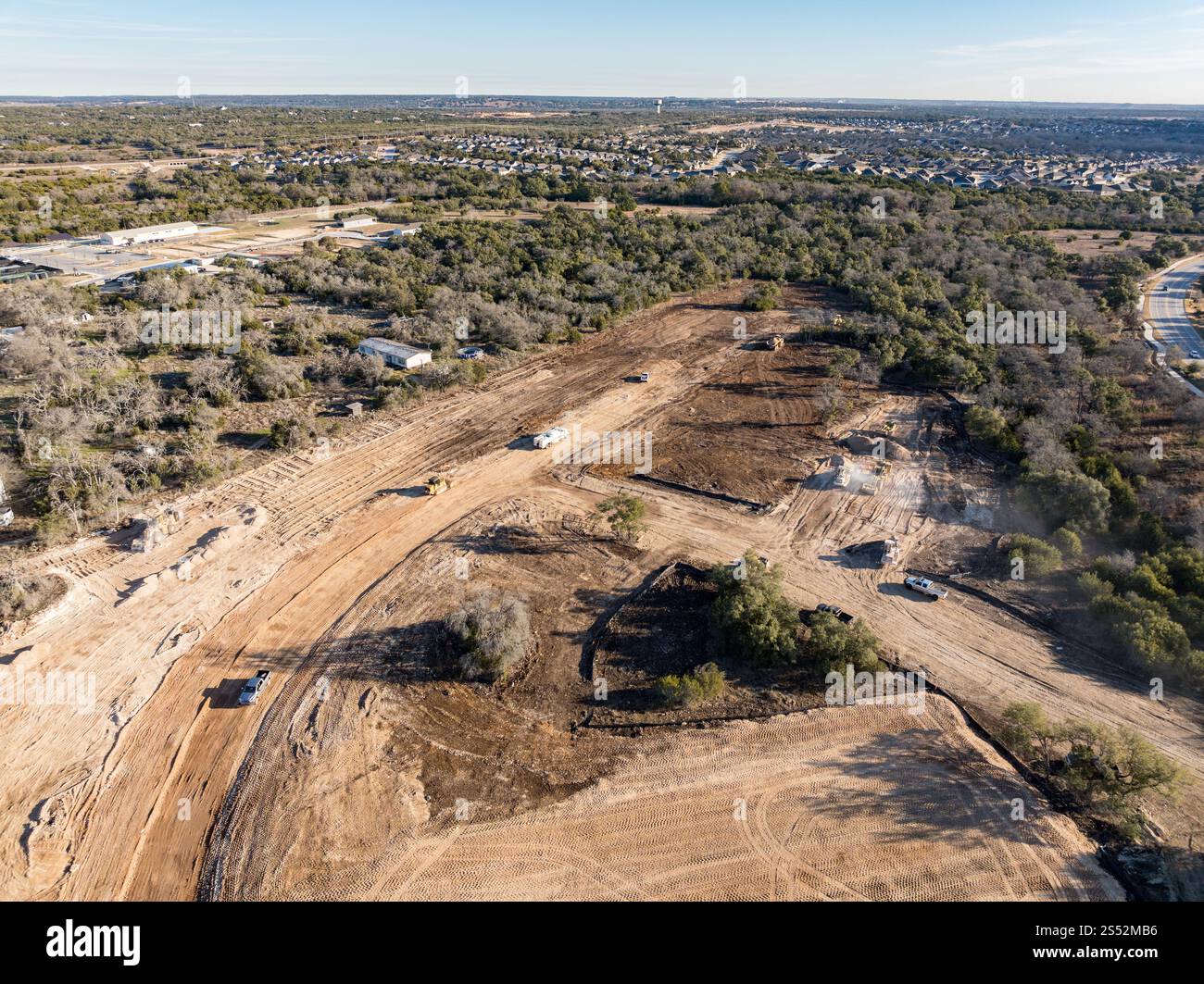 Drone view of construction site being cleared of trees in preparation ...