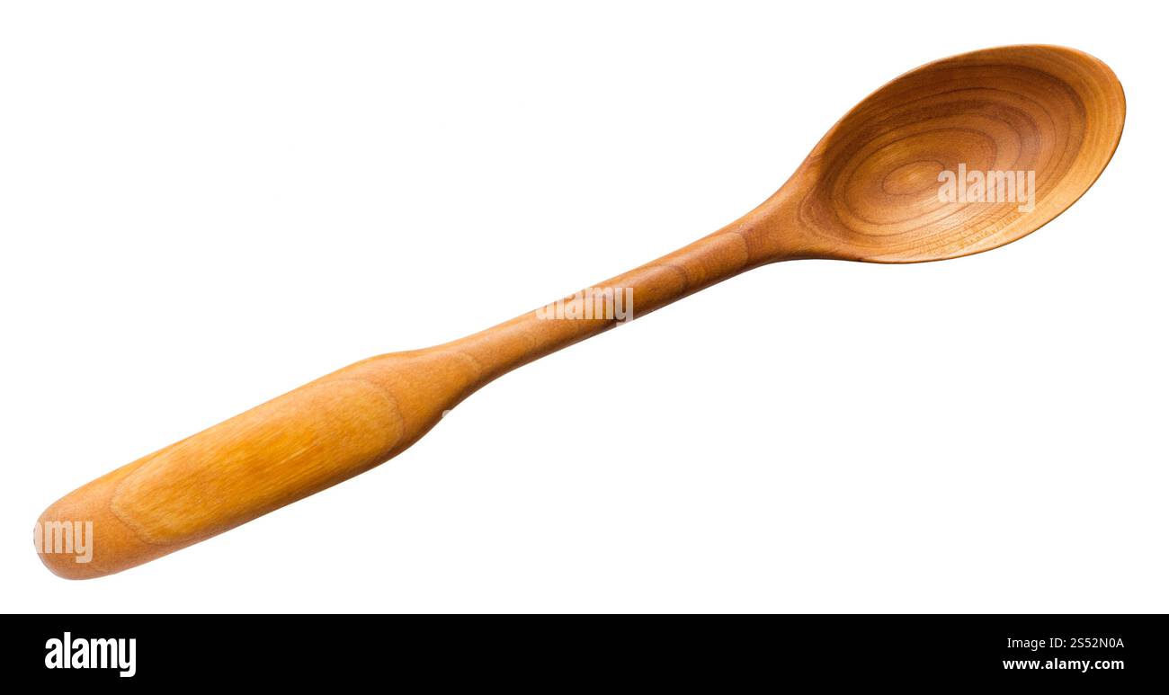 top view of hand carved wooden spoon from cherry tree isolated on white ...