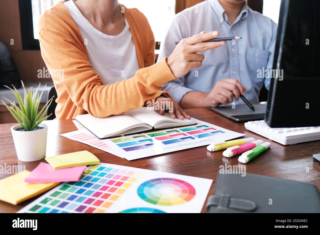 Graphic designer working on digital tablet. artist drawing on graphic ...