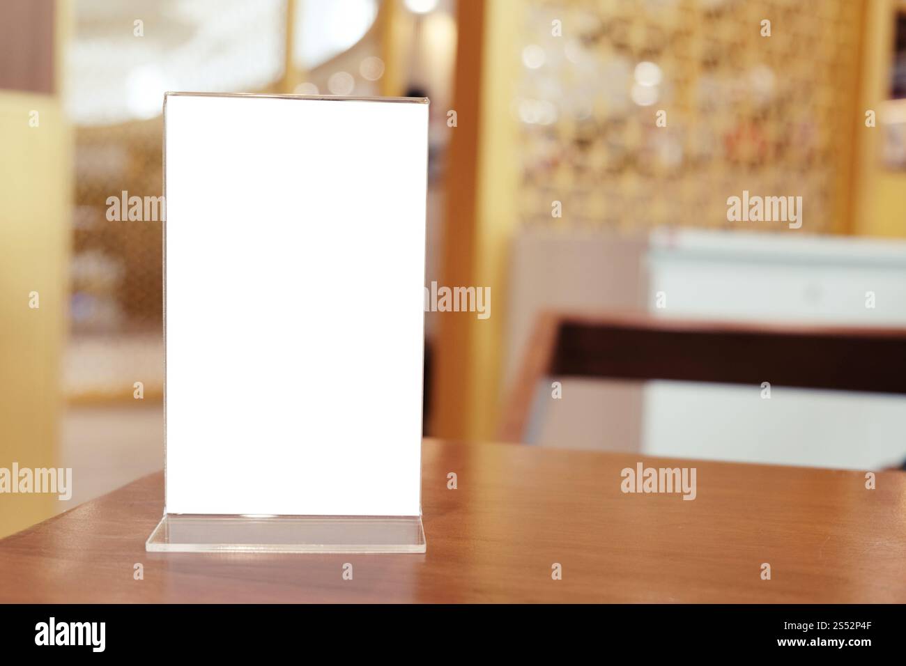 Menu frame standing on wood table in Bar restaurant cafe. space for ...