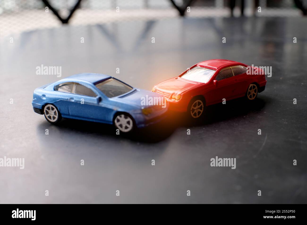 Toy cars crash accident. Simulation red and blue car Stock Photo - Alamy