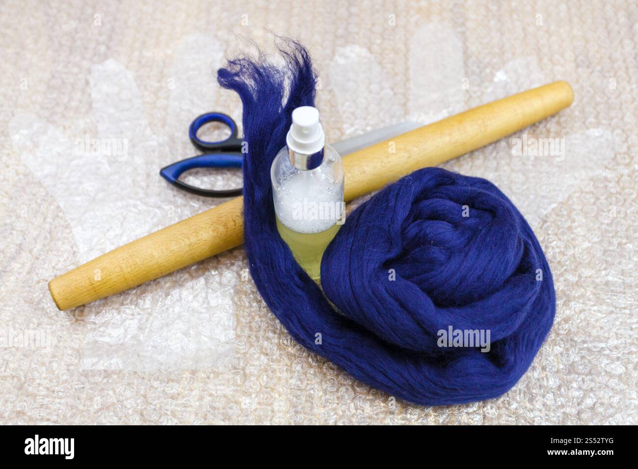 workshop of hand making a fleece gloves from Merino sheep wool using ...