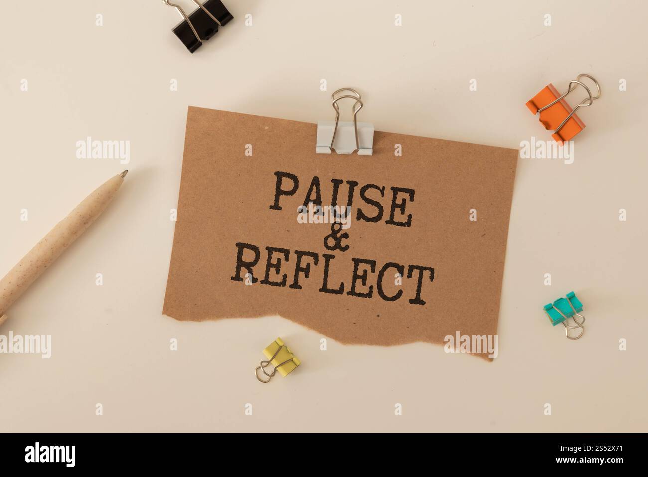 Blackboard written pause reflect with alarm clock. Pause and reflect ...