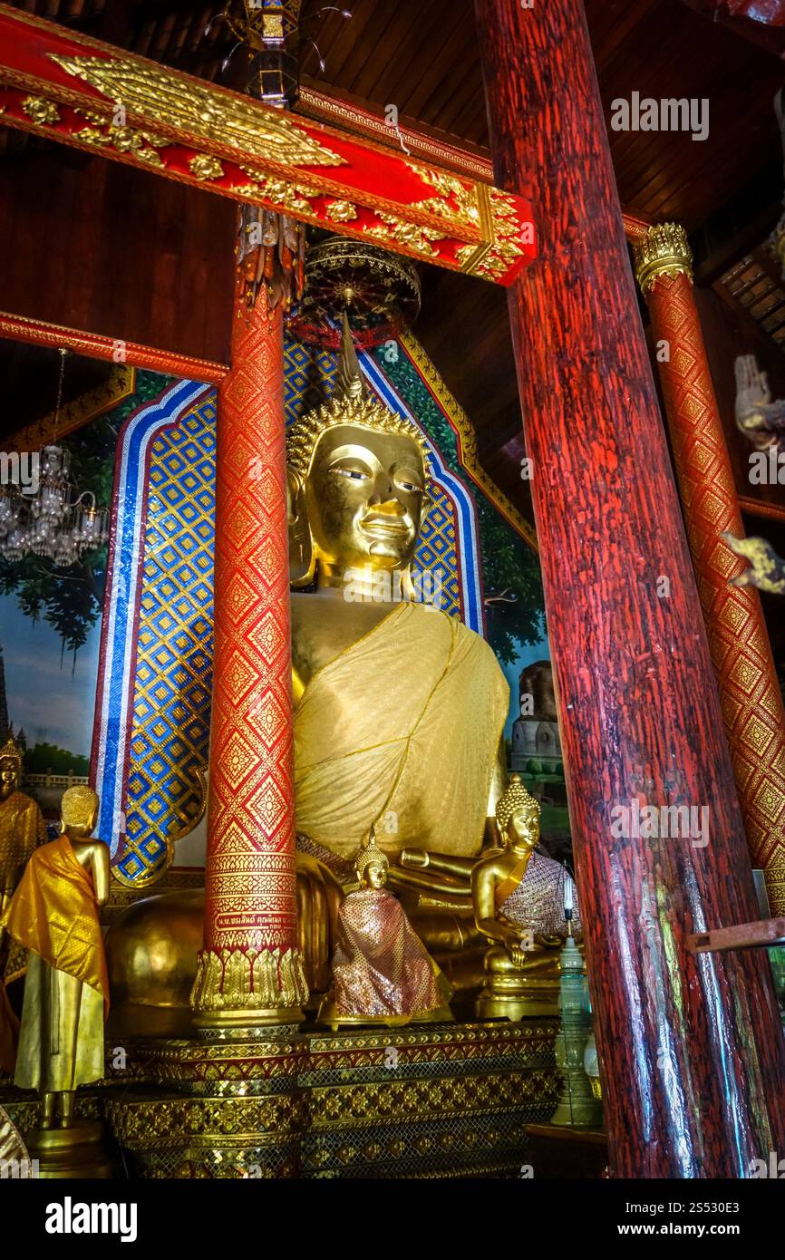 Golden Buddha statue in Wat Chomphu temple, Chiang Mai, Thailand ...