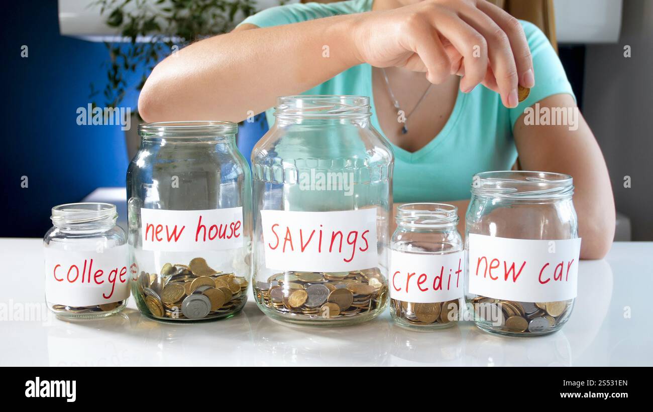 Closeup image of young woman managing her money. Closeup photo of young ...