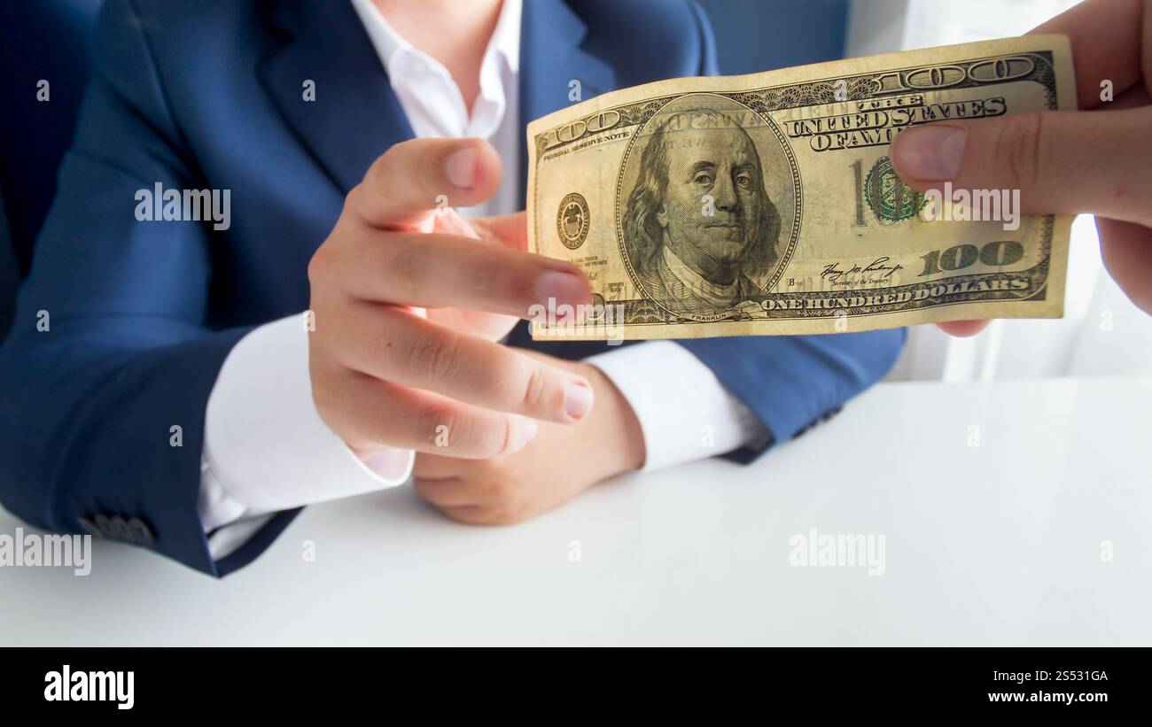 Closeup photo of person giving bribe to corrupted politician. Closeup ...