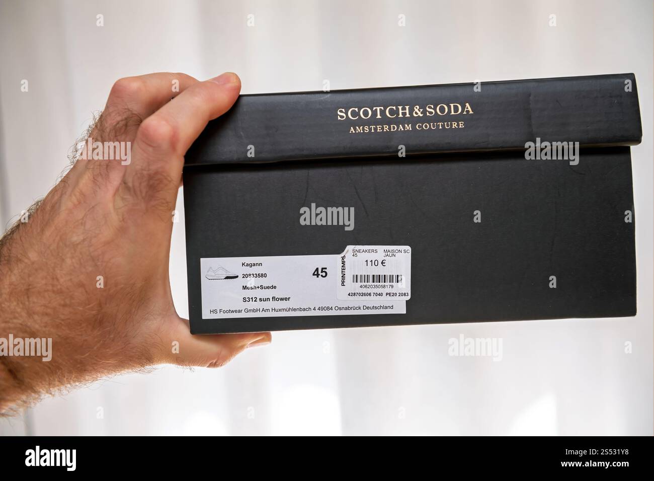 Paris, France - Sep 6, 2021: A black Scotch and Soda shoe box with gold ...