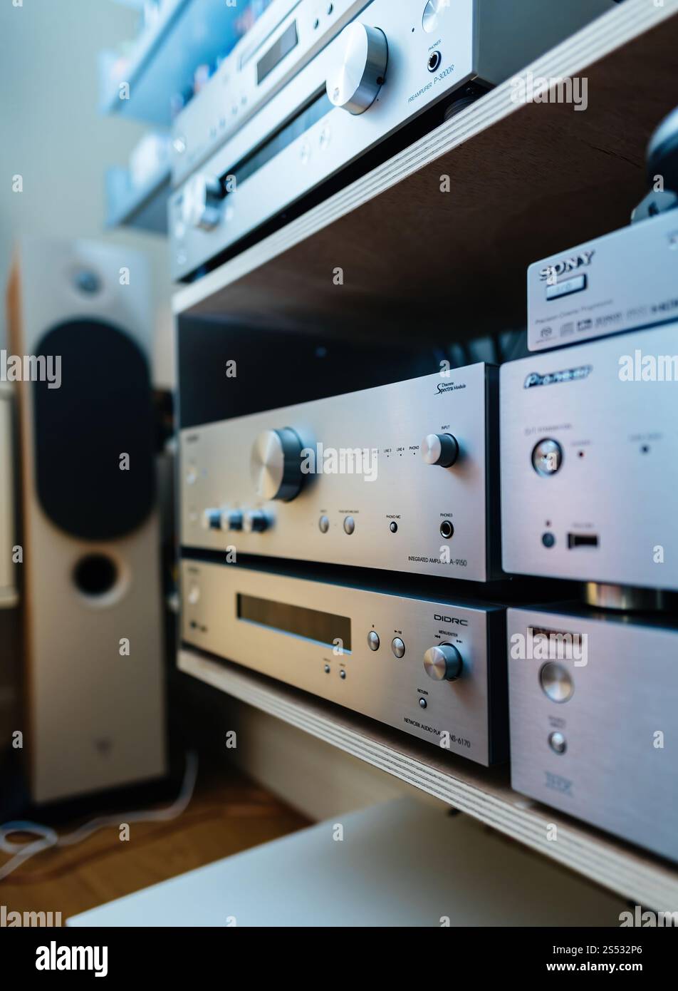 Paris, France - Dec 9, 2024: Side view of a hi-fi audio setup featuring ...