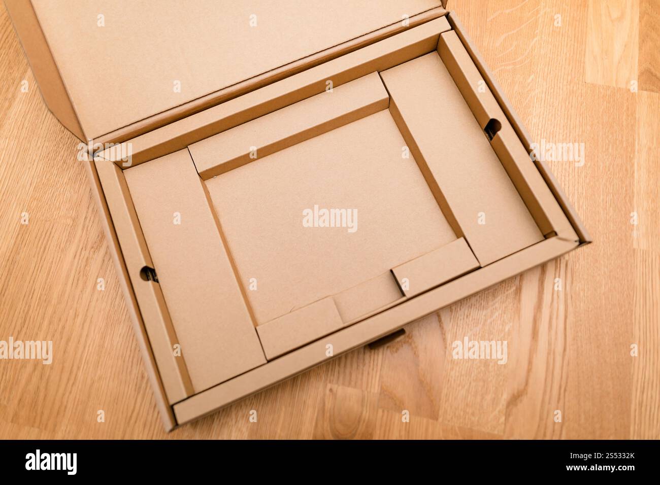 A cardboard box featuring neatly arranged compartments for organizing ...