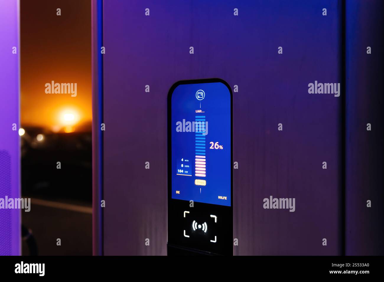 A close-up of an electric vehicle charging station screen showing a 26 ...