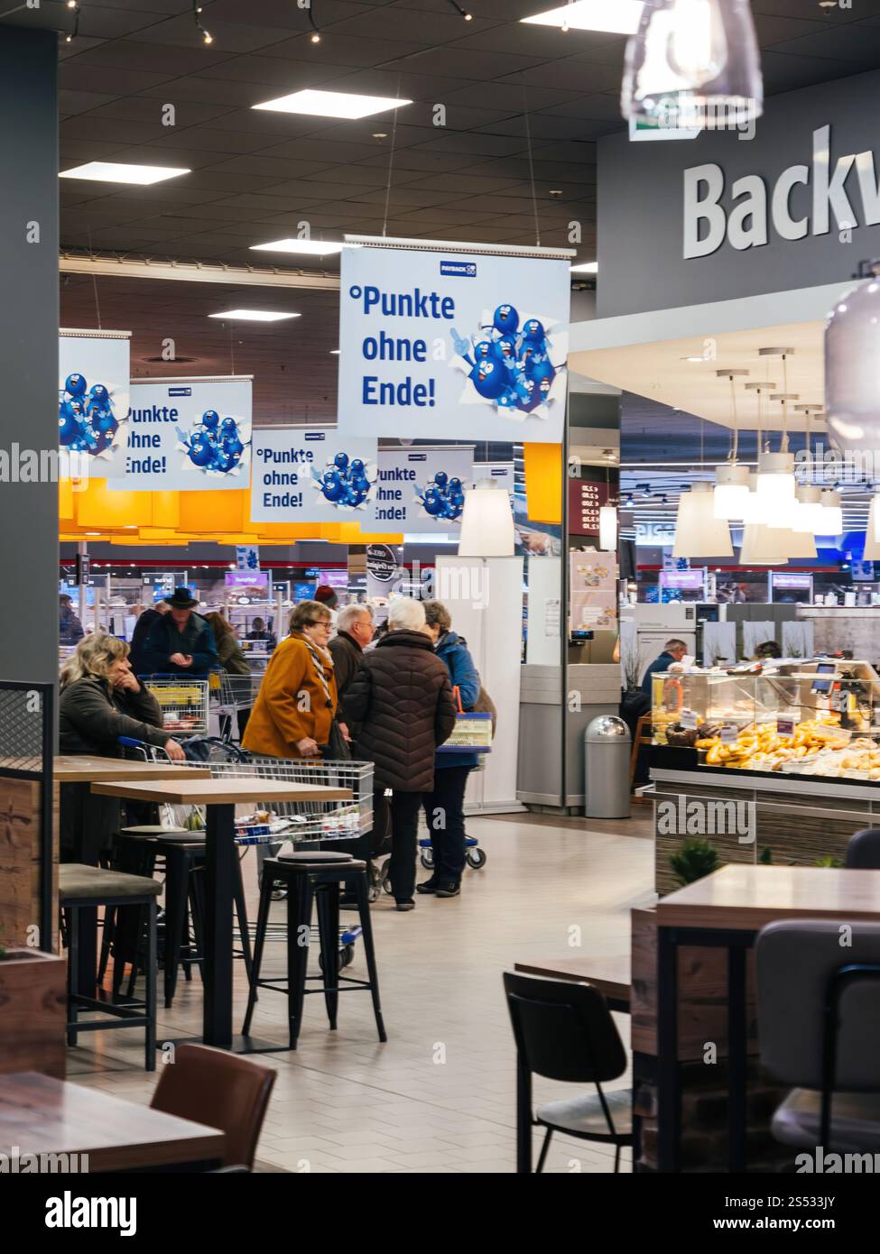 Aachern, Germany - Jan 3, 2025: Interior of an Edeka store featuring ...