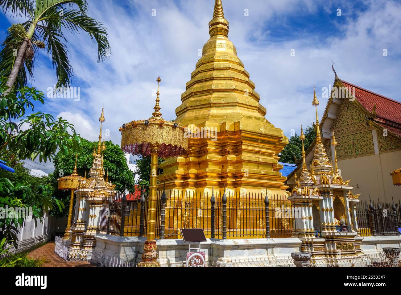 Golden Pagoda in Wat Chomphu temple, Chiang Mai, Thailand. Wat Chomphu ...