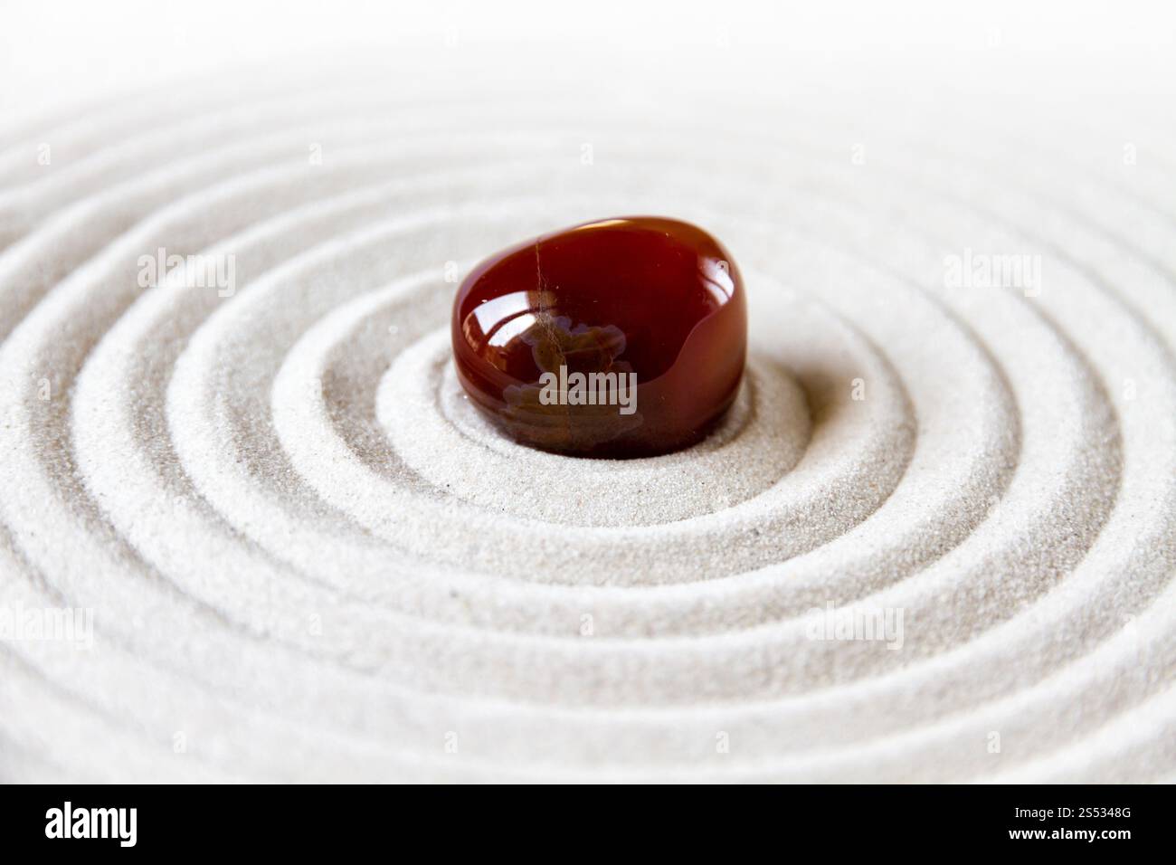 Shiny stone in the sand. Zen japanese garden background scene. Zen ...