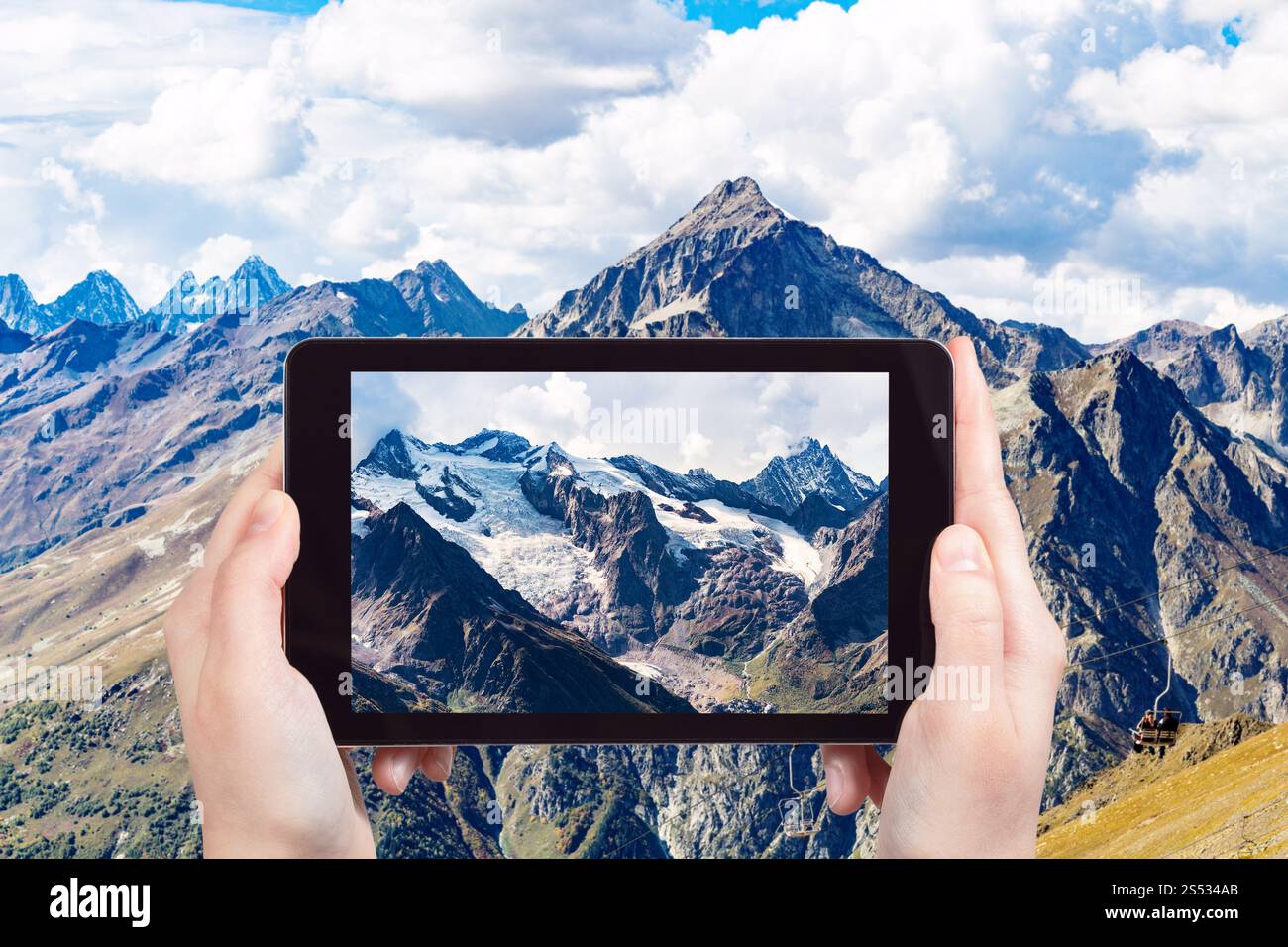 travel concept - tourist photographs of mountain tops from Moussa ...