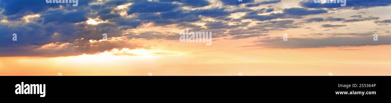 Summer sunset sky panorama with fleece clouds. Summer evening good ...
