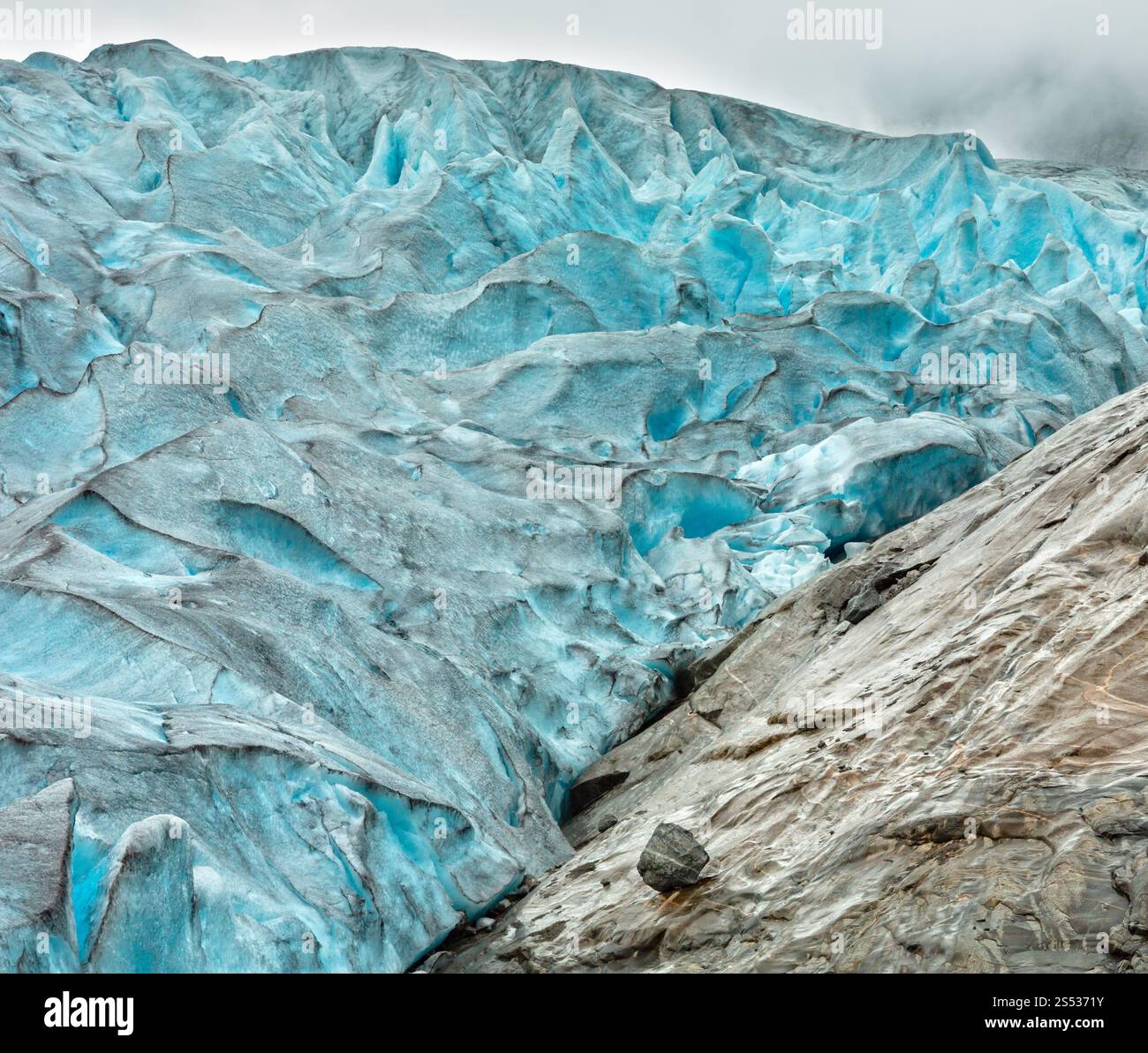 Summer cloudy view to Nigardsbreen Glacier, Jostedal, Norway. Beautiful ...