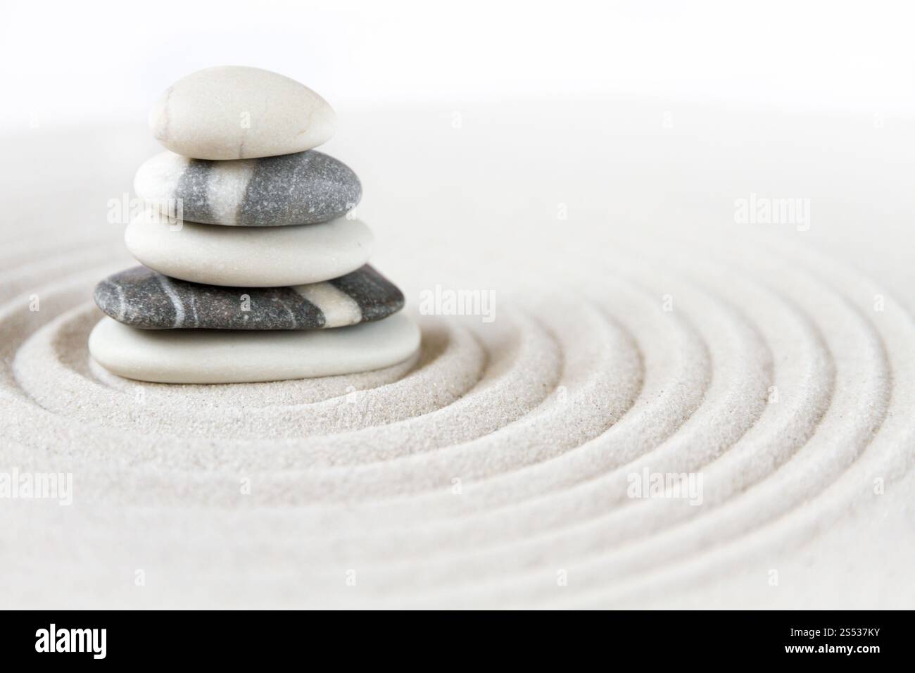 Black and white stones in the sand. Zen japanese garden background ...