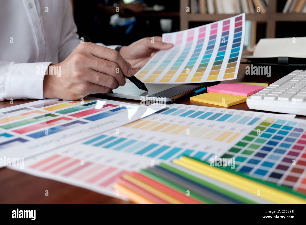 Graphic designer working on digital tablet. artist drawing on graphic ...